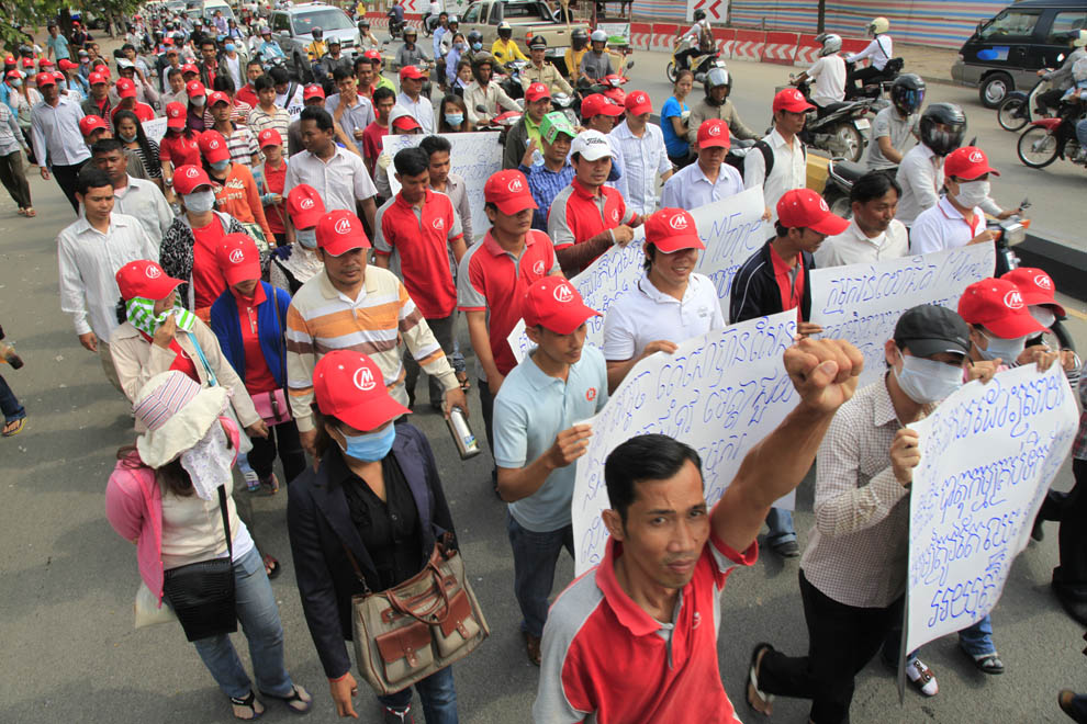 Mfone workers paid, a little | Phnom Penh Post